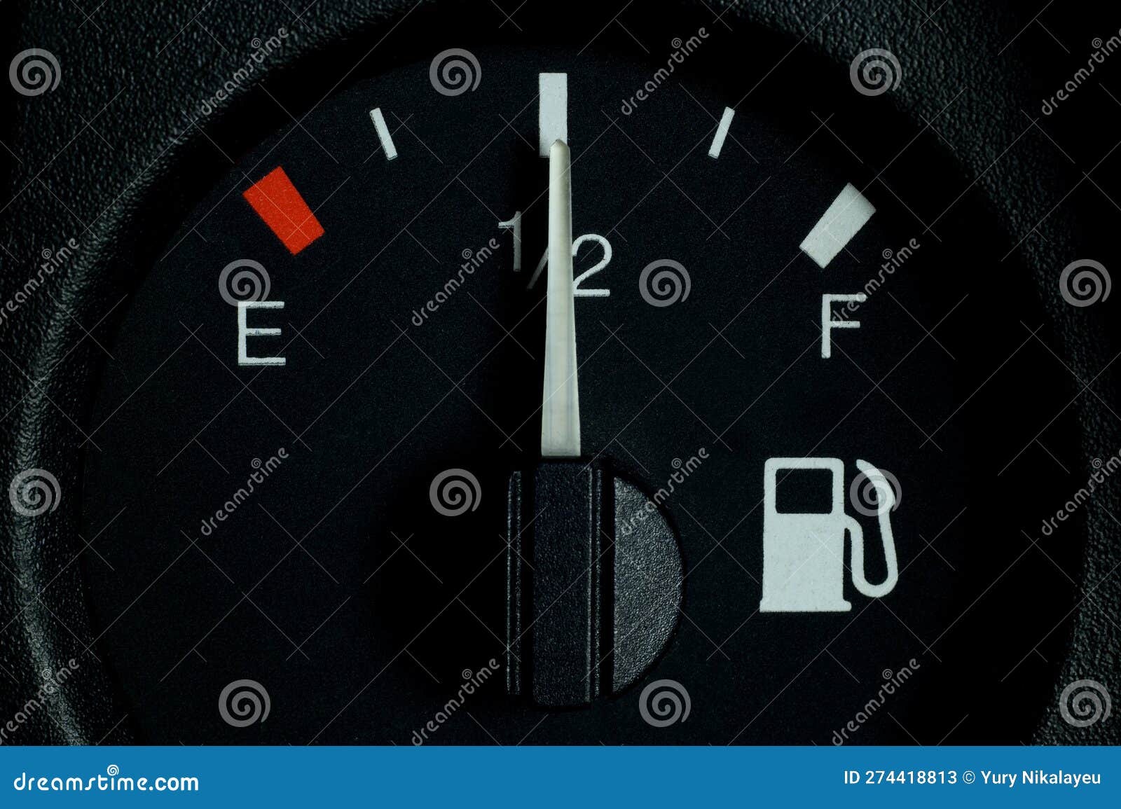 The Indicator on the Car Panel, Half of the Fuel Tank. Close-up Stock ...