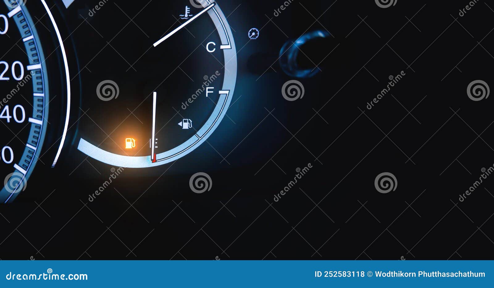 An Indicator for Low Fuel is Illuminated on a Dashboard Stock Photo ...
