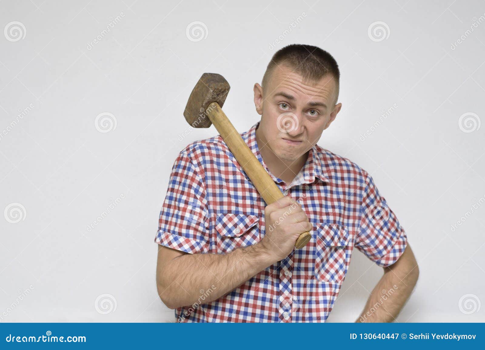 Indignant Man with a Sledgehammer on a White Background. Work Co Stock ...