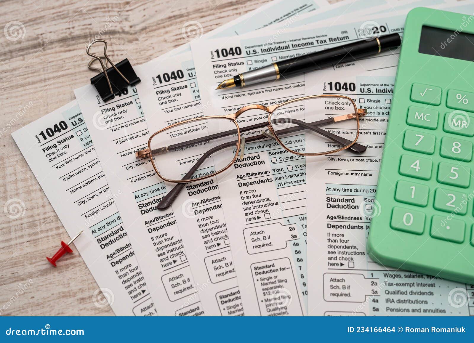 Pen On 1040 US Individual Income Tax Filling Form With Calendar, Tax ...