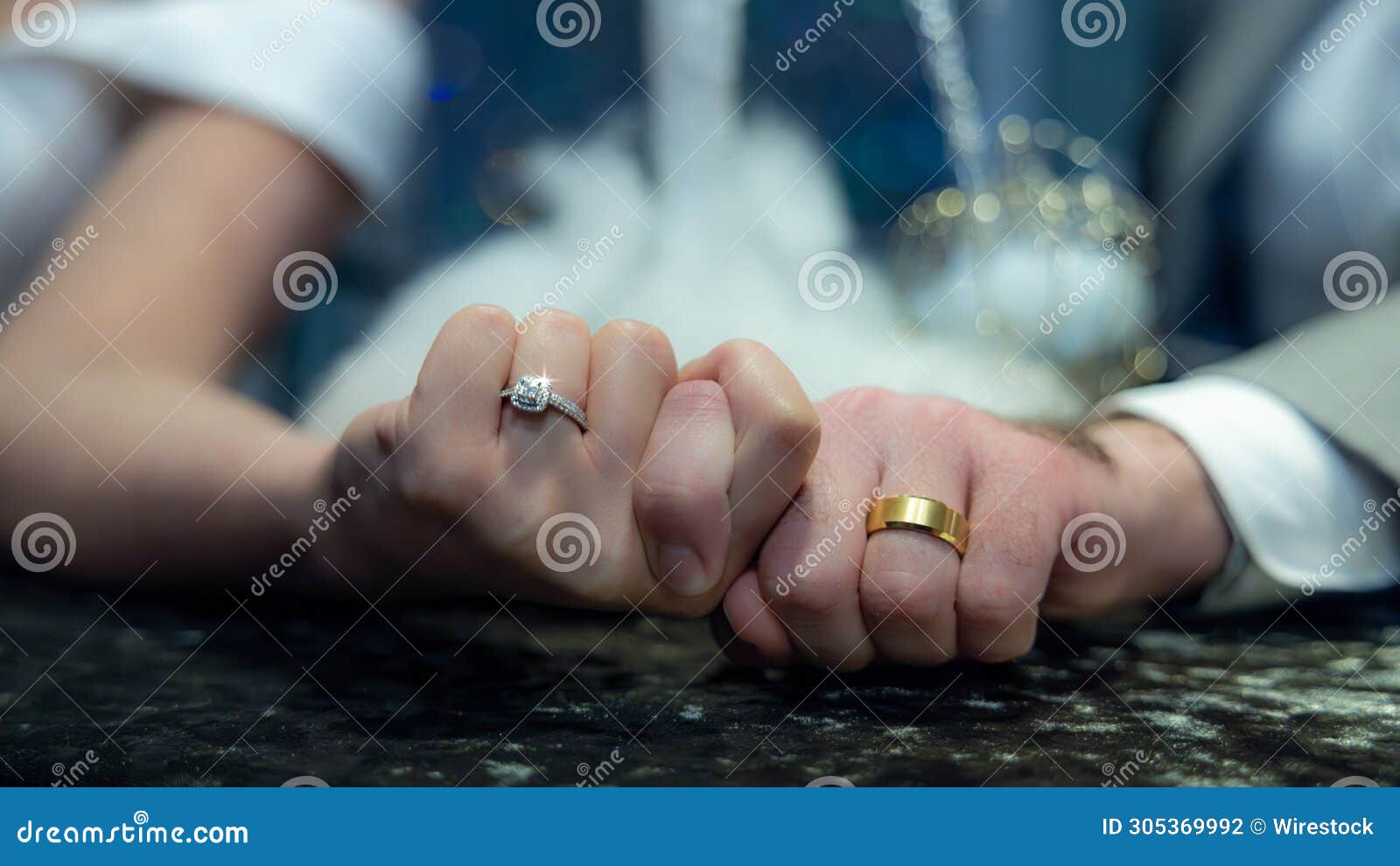 Individuals Touching Hands, Their Wedding Rings a Symbol of Their Love ...