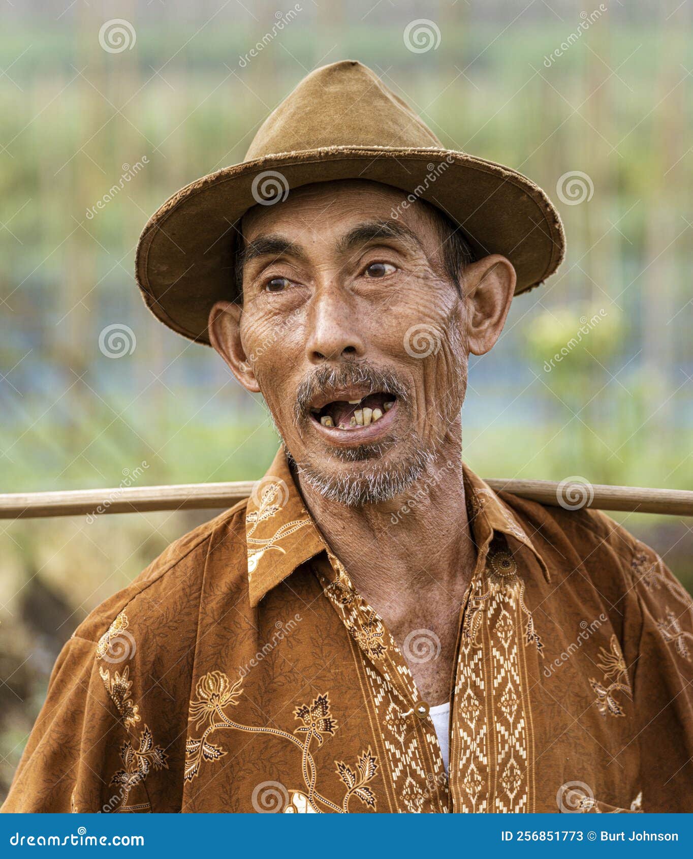 Indonesia, June 13 2022 - Old Man with Missing Teeth Smailes when ...