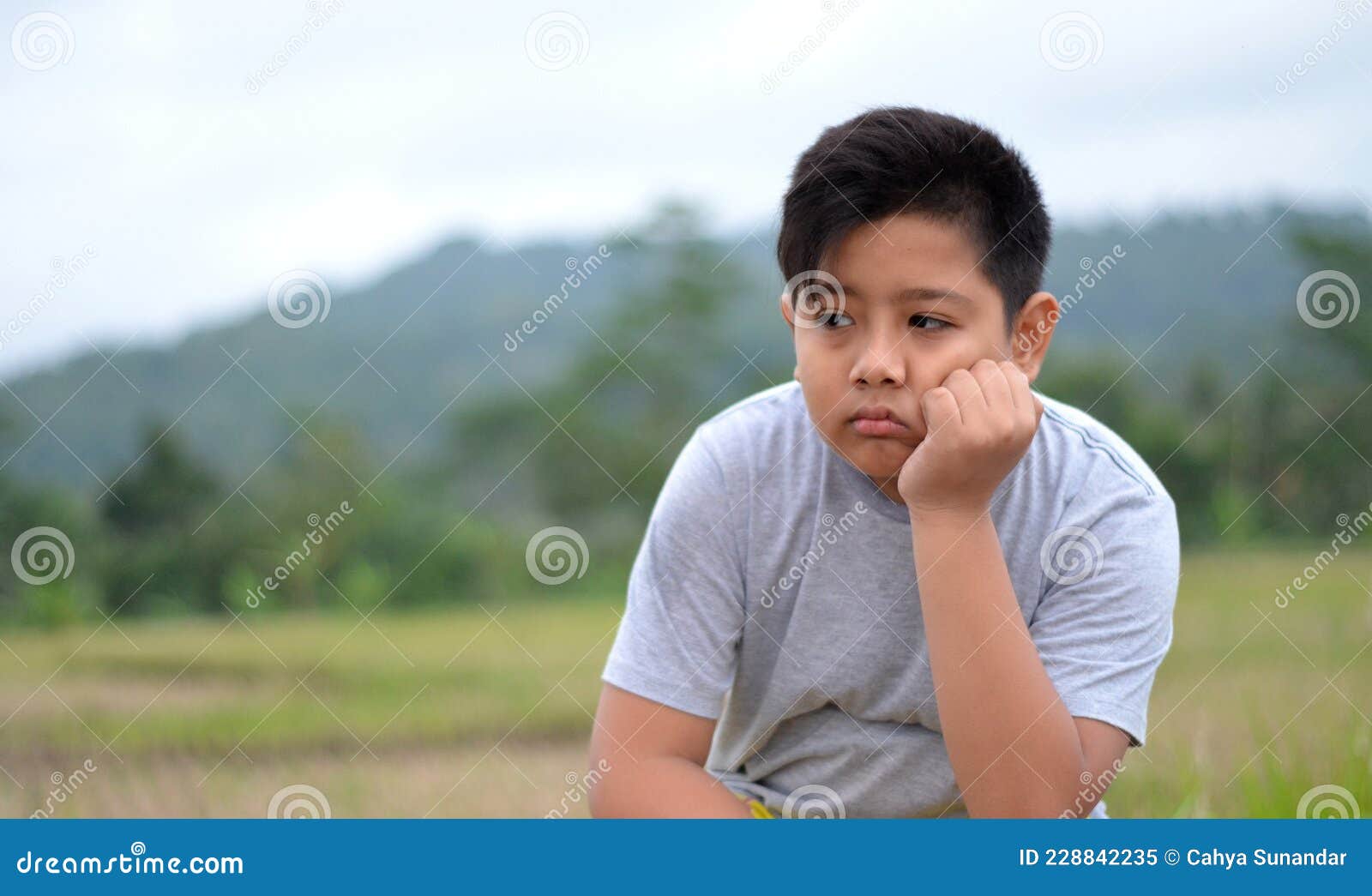 Indonesian Boy with Sad Expression. Stock Image - Image of asia ...