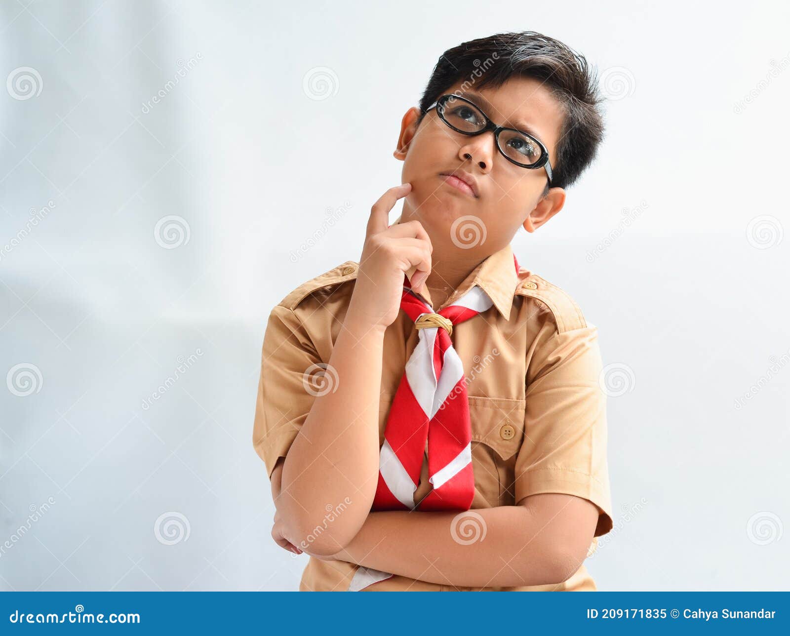Handsome Indonesian Boy Scouts with Thinking Expression Stock Image ...