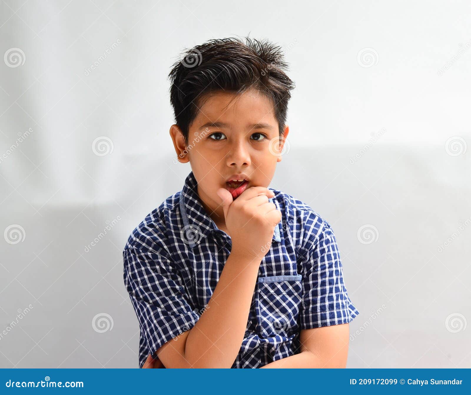 Indonesian Boy with Thinking Expression Stock Image - Image of ...