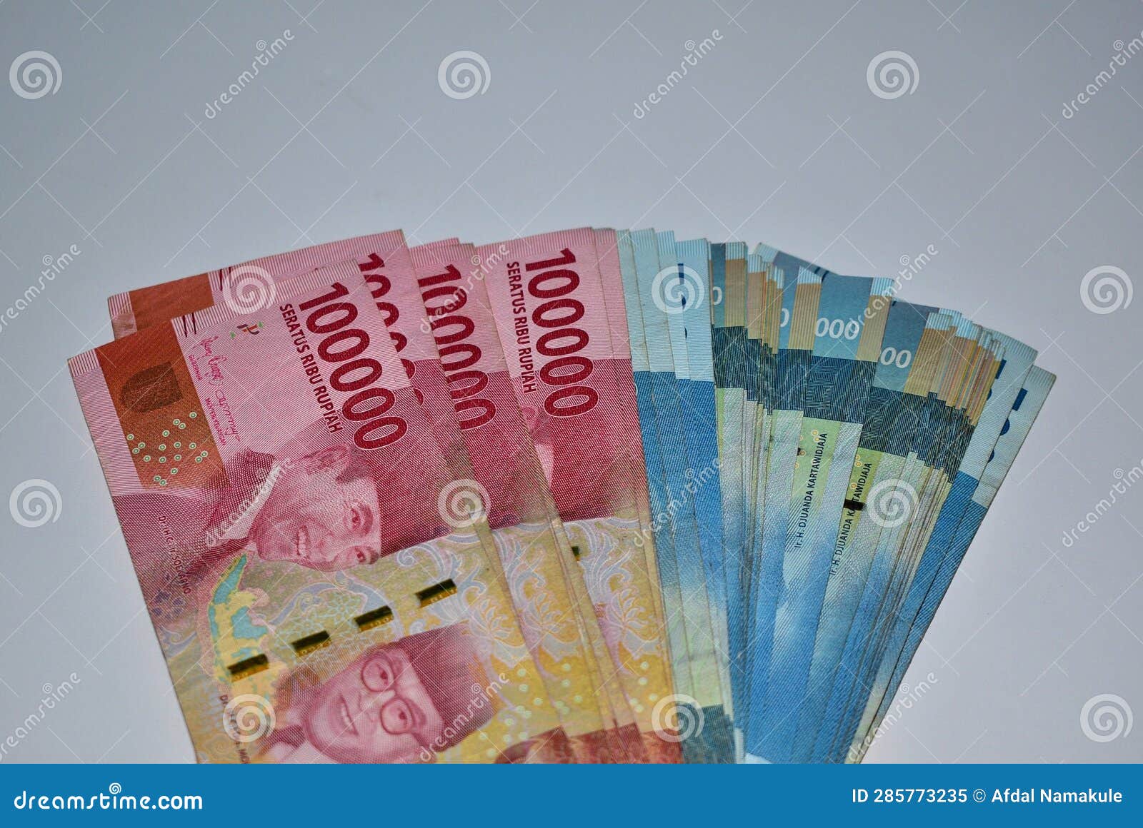 Indonesian Rupiah Banknotes in the 100,000 and 50,000 Denominations ...