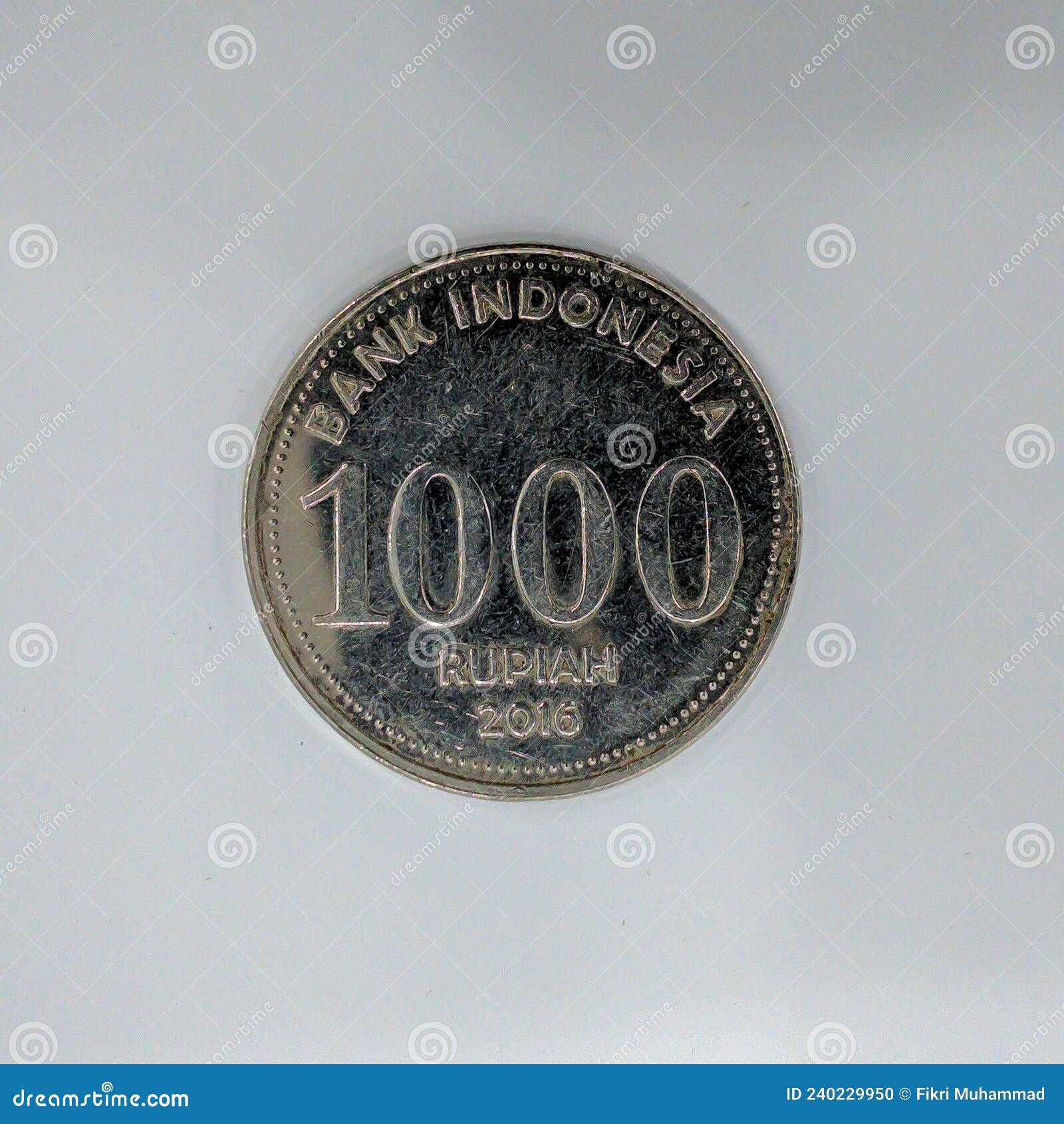 1000 Indonesian Rupiah Coins in Circulation in 2016 Stock Photo - Image ...
