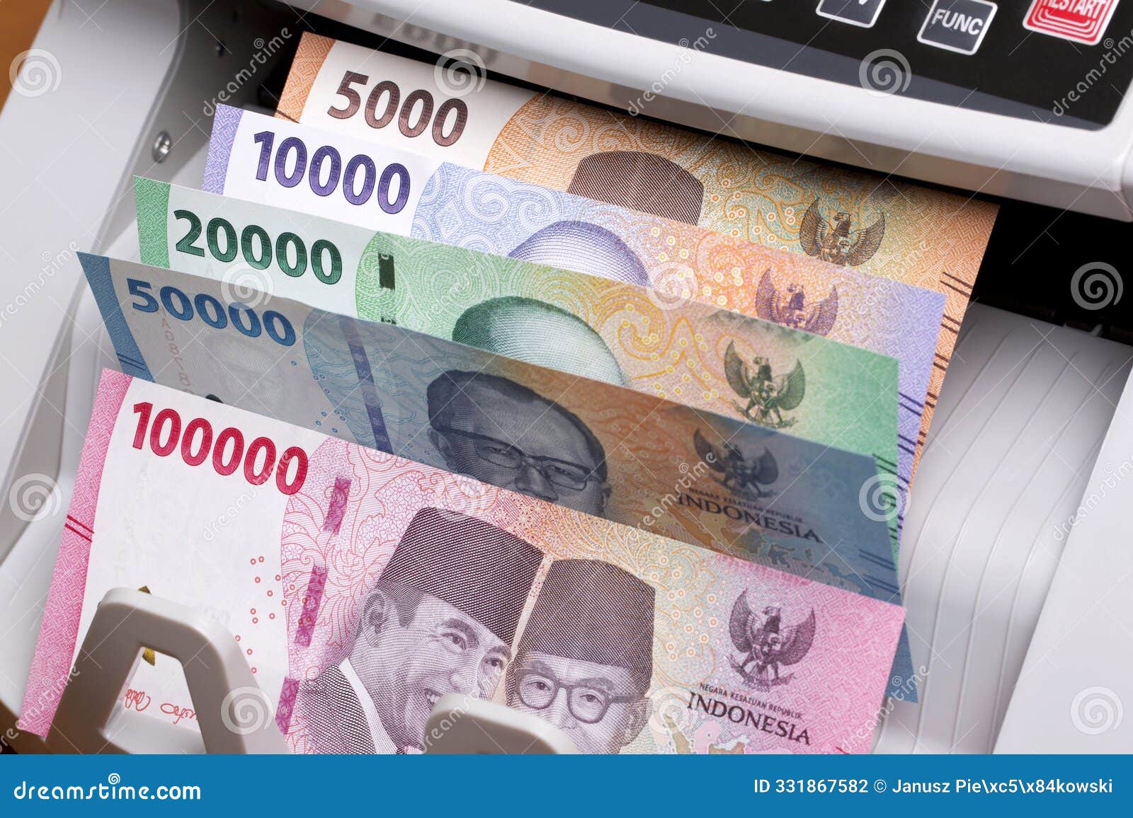 Indonesian Rupiah in the Counting Machine Stock Photo - Image of ...