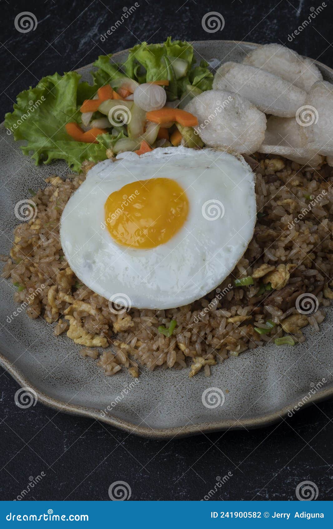 Indonesian Style of Fried Rice with Egg and Crackers Stock Photo ...