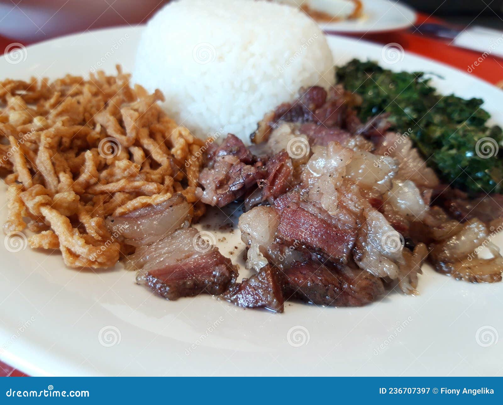 Indonesian Traditional Food Sei Sapi with Cassava Leaf Stock Image ...