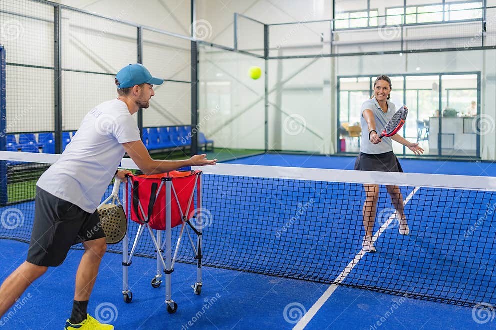Indoor Padel Training: Coach and Female Player Techniques Stock Photo ...