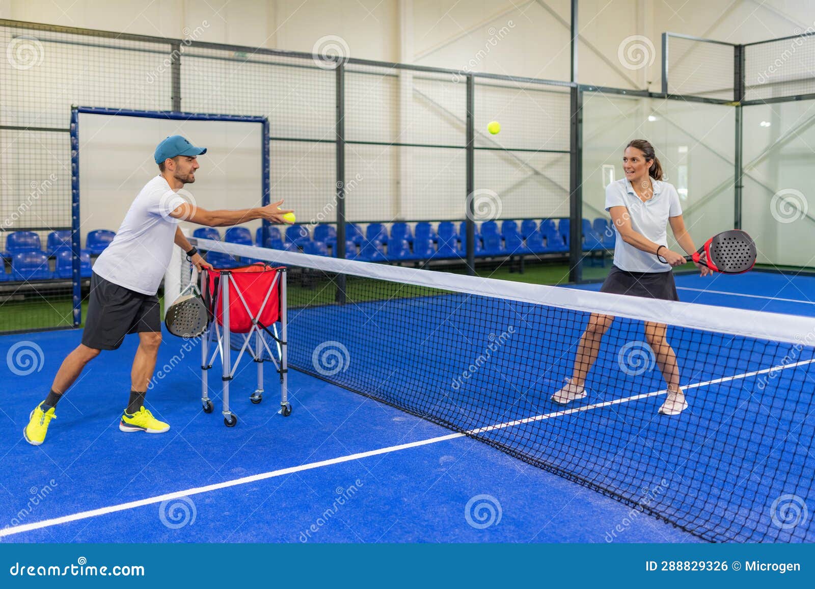 Indoor Padel Training. Coach Partners Female Player for Effective ...
