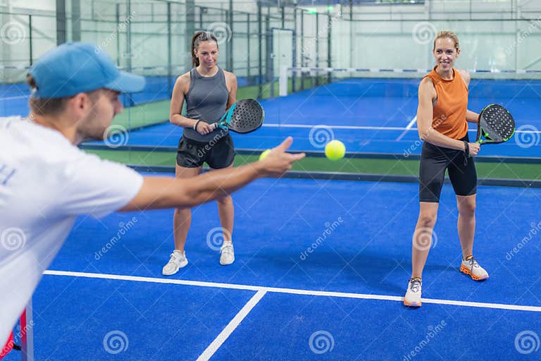 Indoor Padel Training: Partnered Skill Development Stock Photo - Image ...
