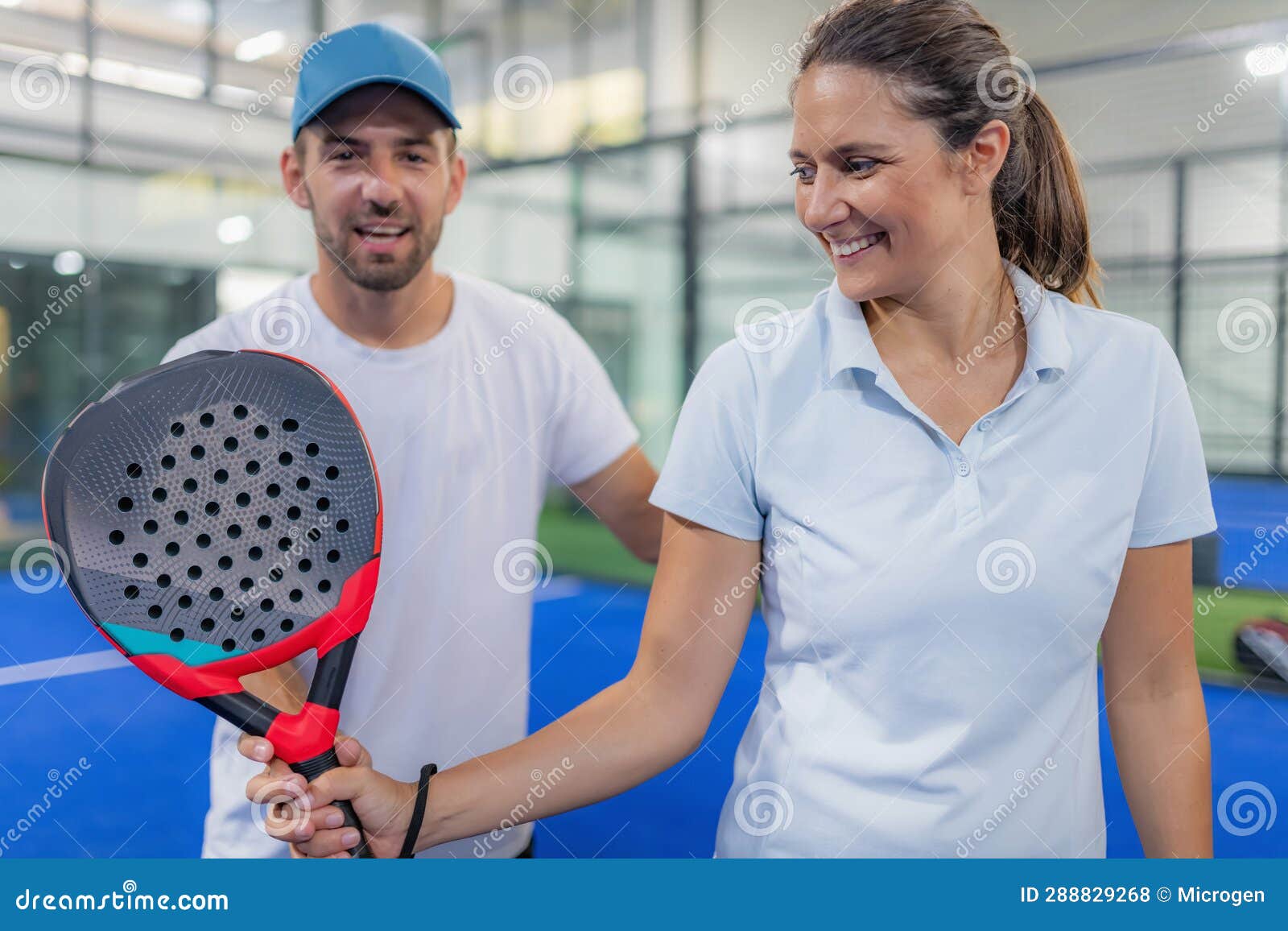 Indoor Padel Training. Trainer and Woman Improving Her Techniques Stock ...