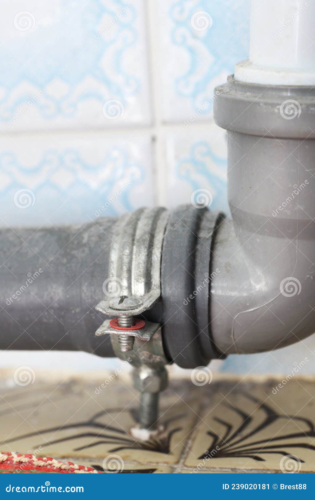 Indoor Plastic Sewer Pipe with Fixing for Floor and Wall. Stock Image ...