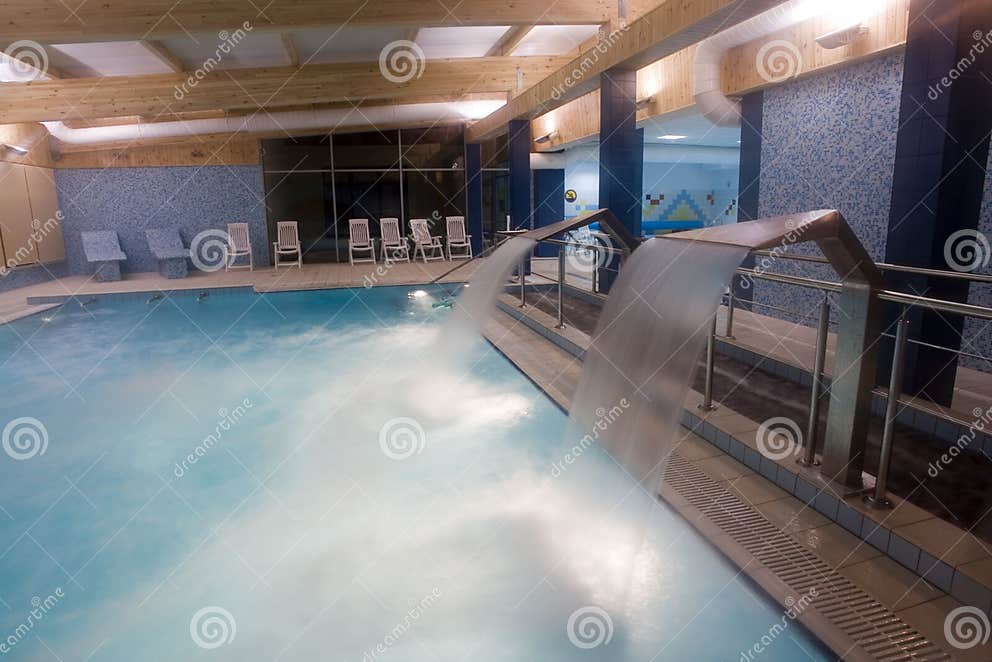 Indoor Pool with Waterfalls Stock Photo - Image of facility, design ...