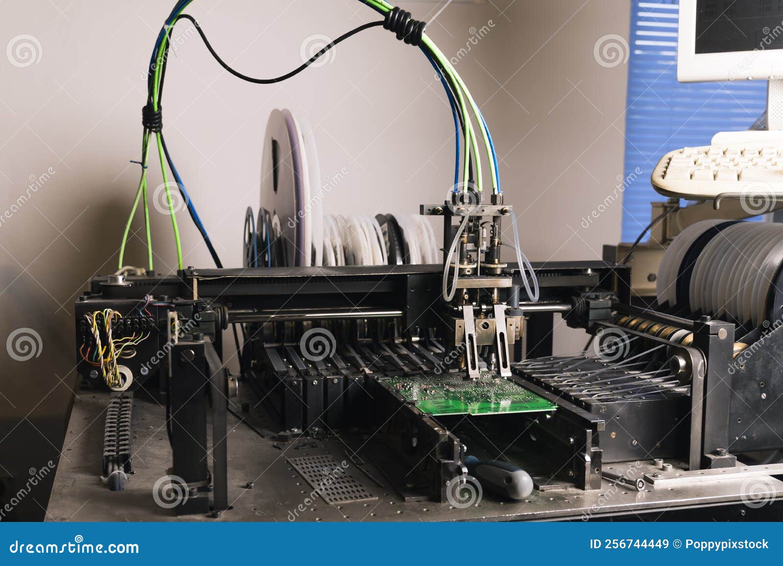 Indoor Shot of a SMD Mounting Machine Used by an Engineer To Connect ...