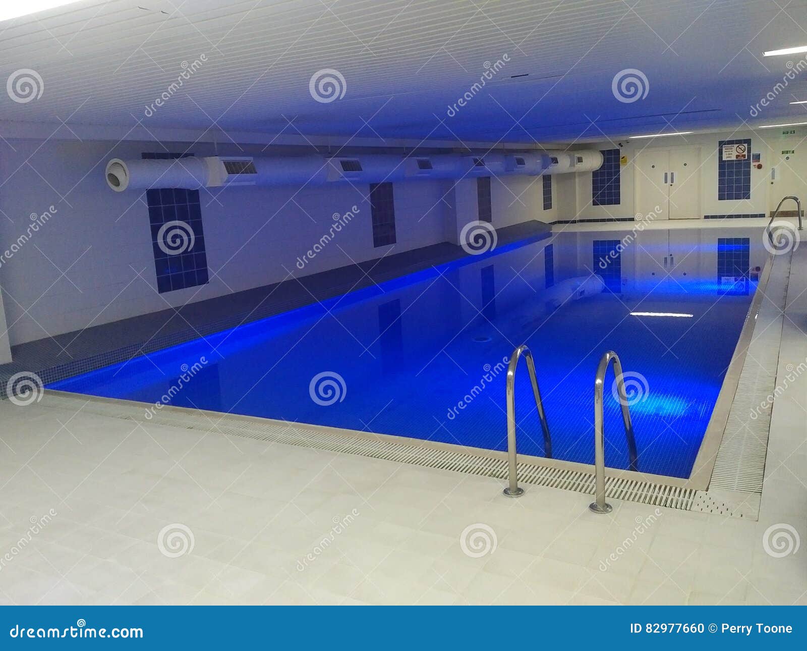 Indoor Swimming Pool stock photo. Image of lighting, indoor - 82977660