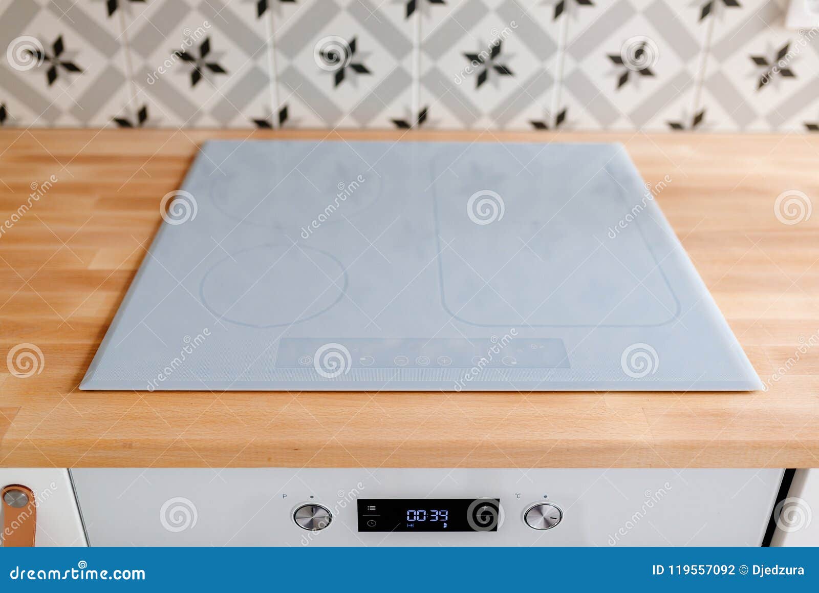 Induction Hob in Electric Kitchen Cooker Stock Photo - Image of plate ...