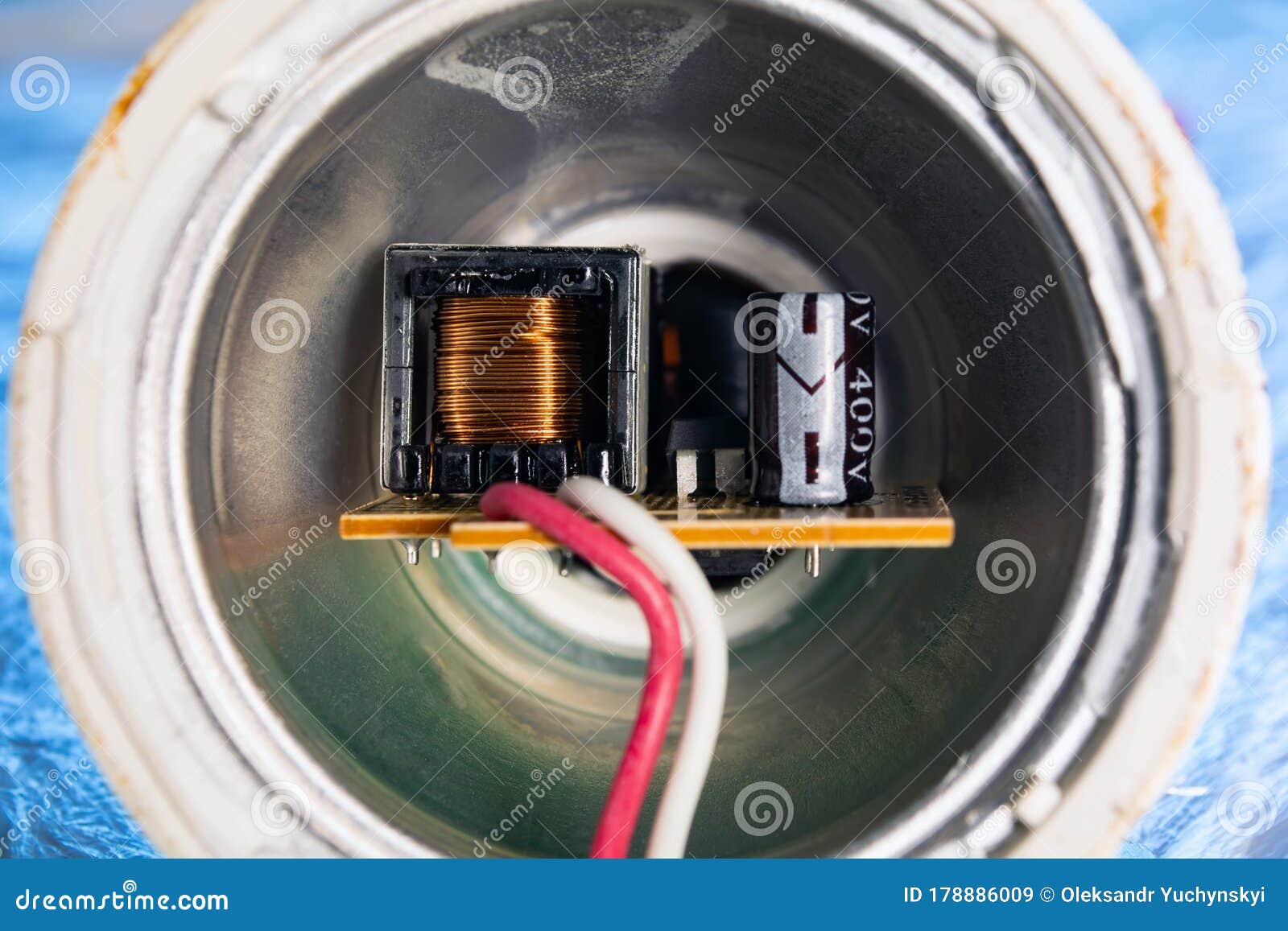 Inductor, Condenser and Microcircuit Inside the LED Lamp Stock Image ...