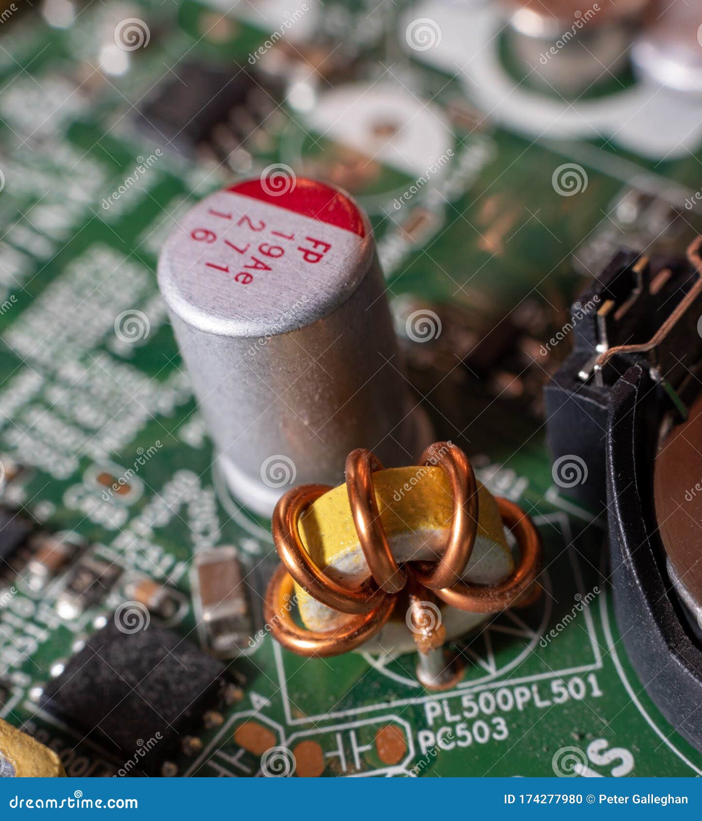 Inductor Copper Coils on the Circuit Board and a Cylinder Stock Photo ...