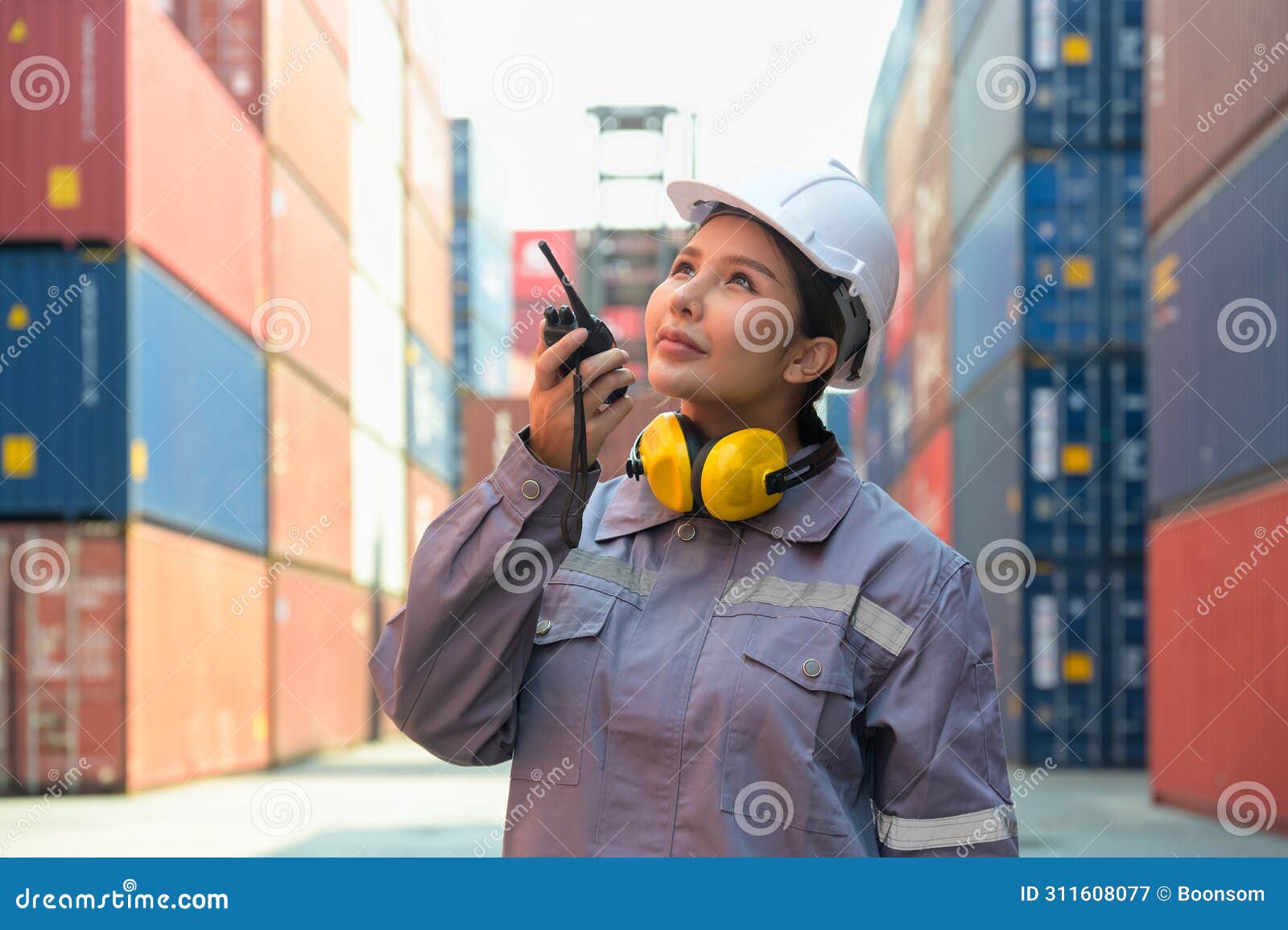 Industrial Asian Female Engineer Checking Containers Using Walkie ...