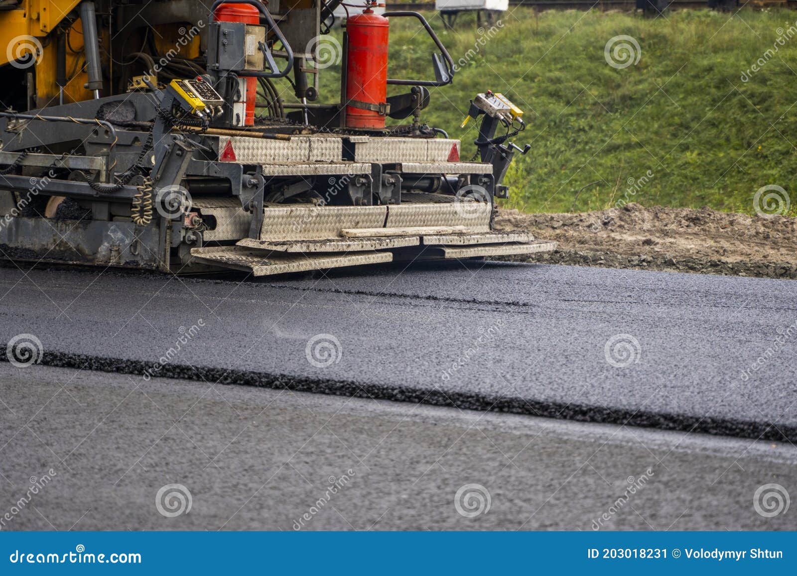 Industrial Asphalt Paver Machine Laying Fresh Asphalt on Road ...
