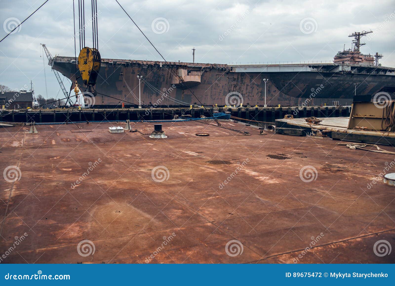 A Metal Platform Protruding From The River Bank On Air Tanks, A Pier To ...