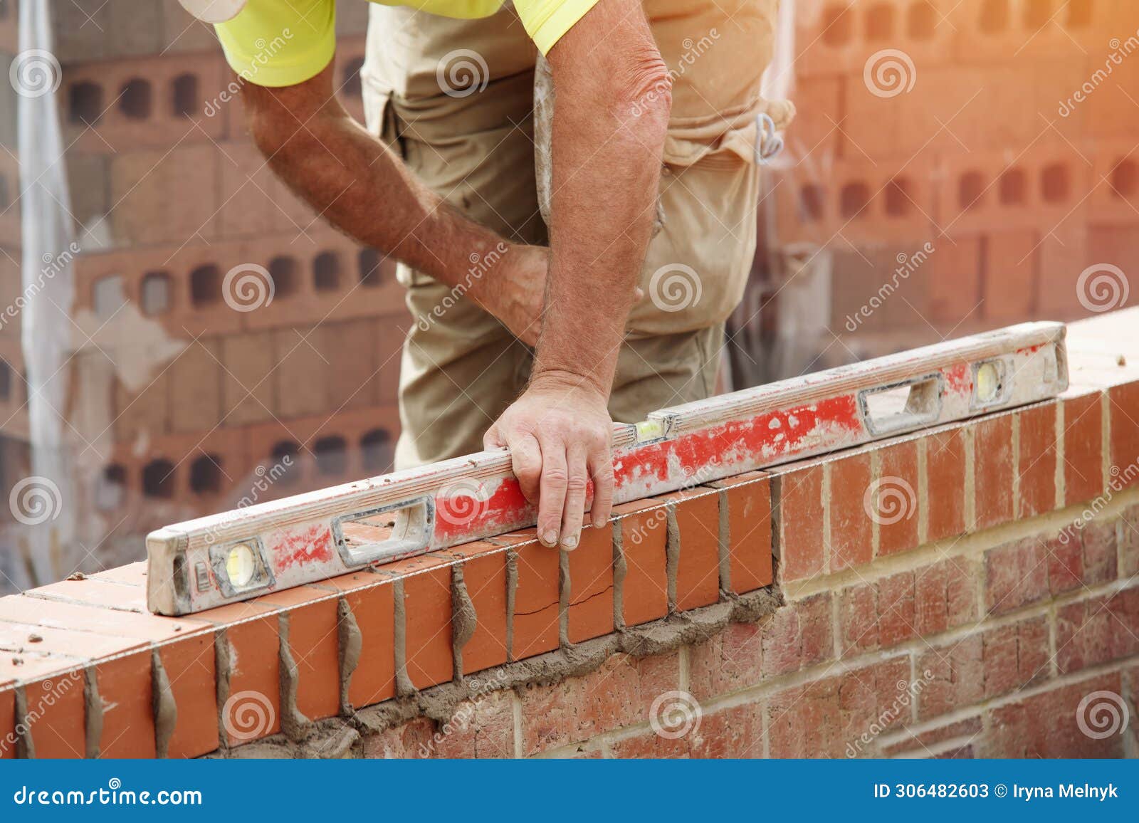 Bricklayer Laying Bricks on Cement Mix on Construction Site Close-up ...