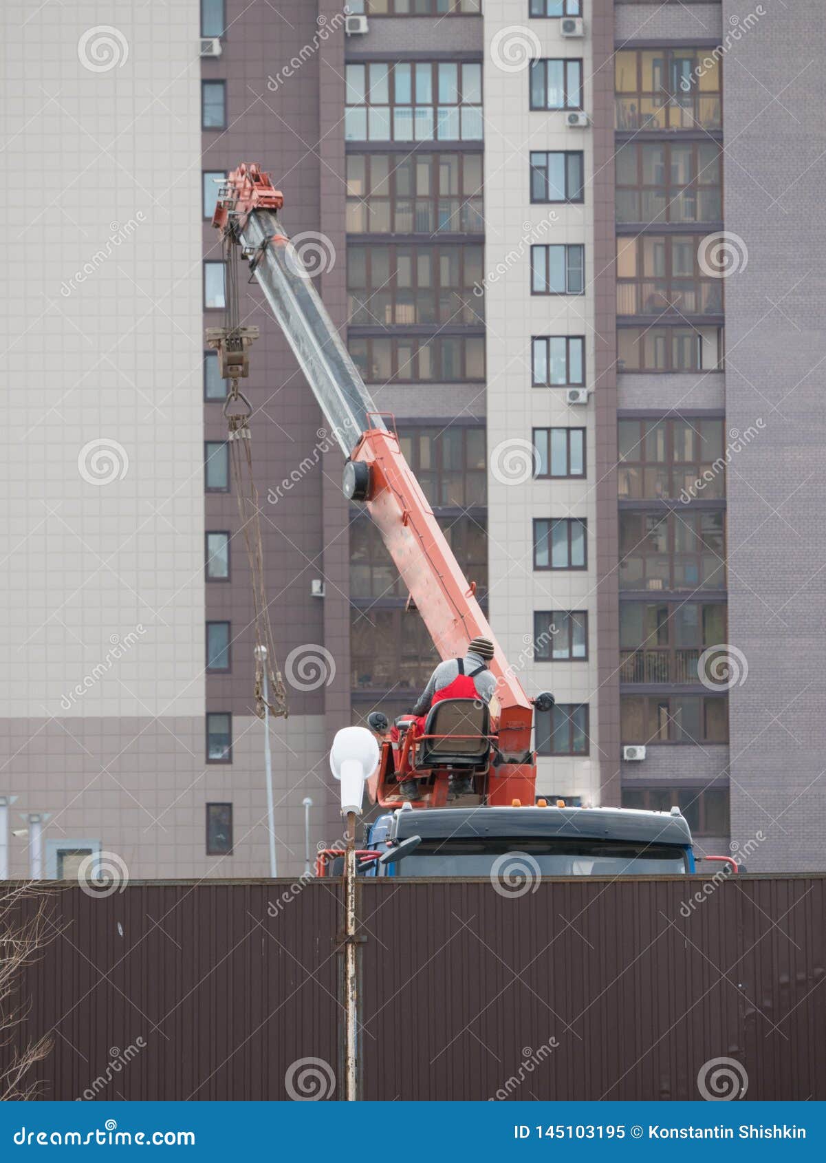 Industrial Building. a Crane Constructing a New Building in the Centre ...
