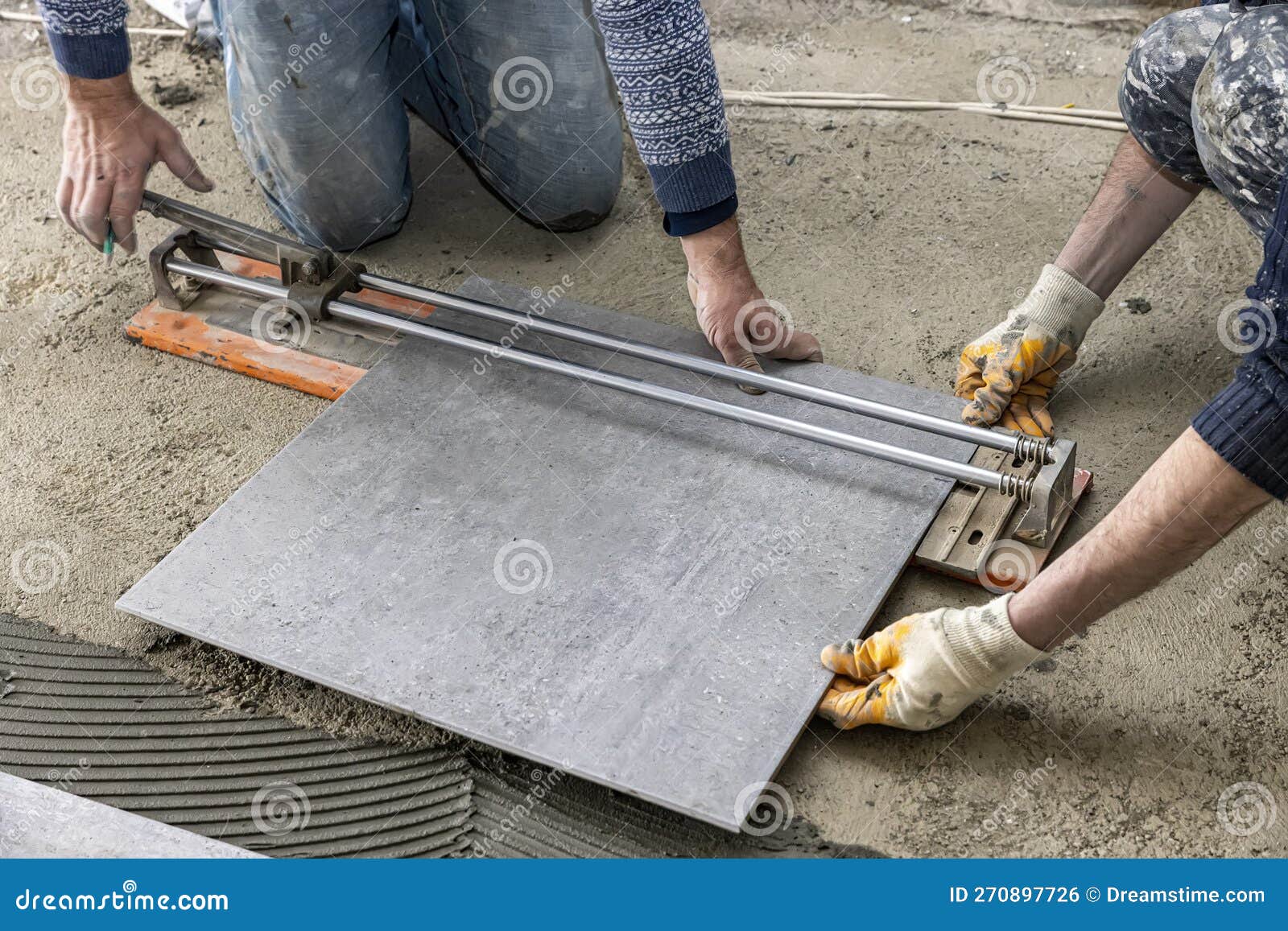 Industrial Ceramic Builder Worker Installing Floor Tile at Repair ...