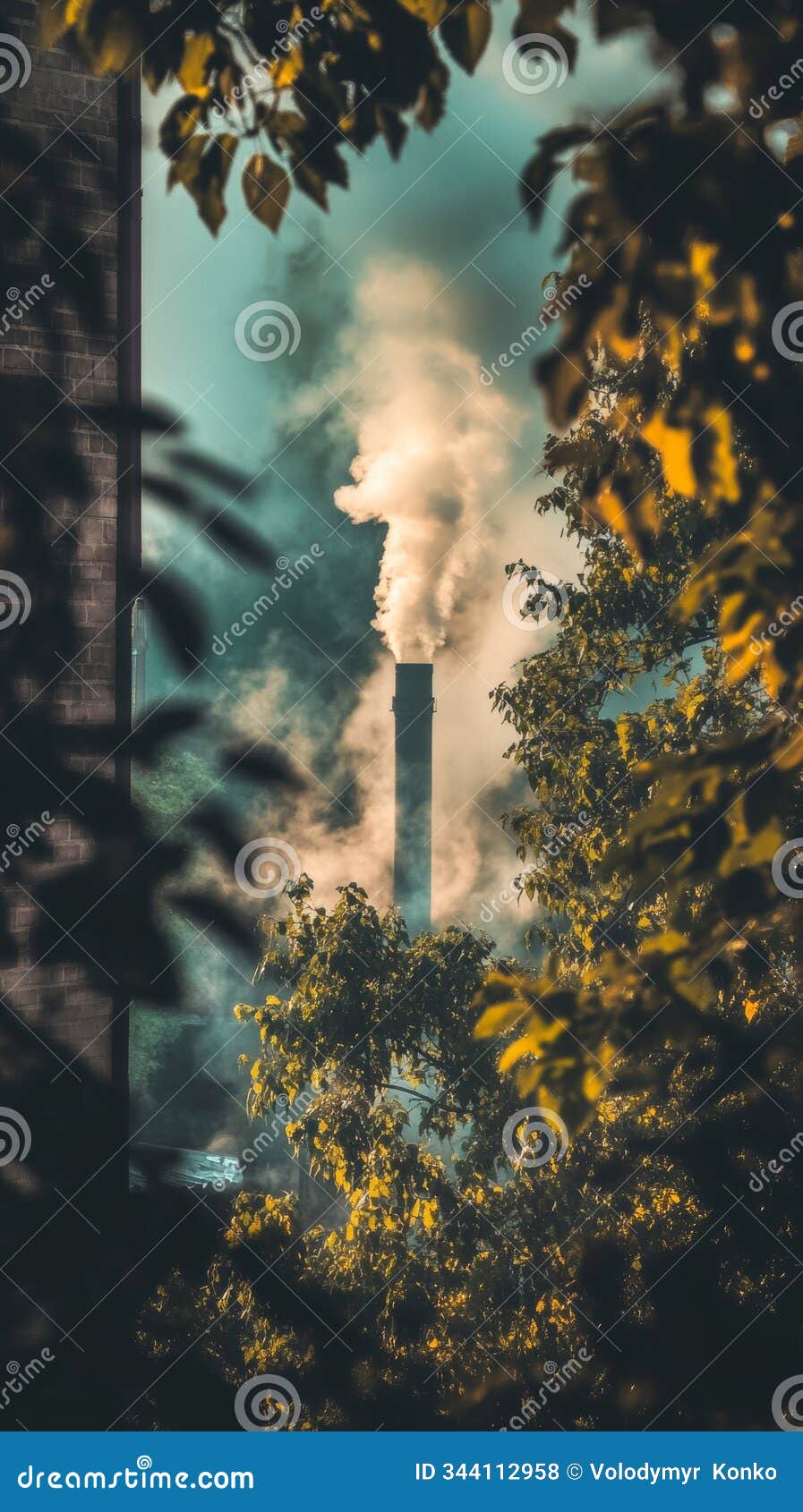 Industrial Chimney Emitting Smoke Surrounded by Trees at Sunset Stock ...