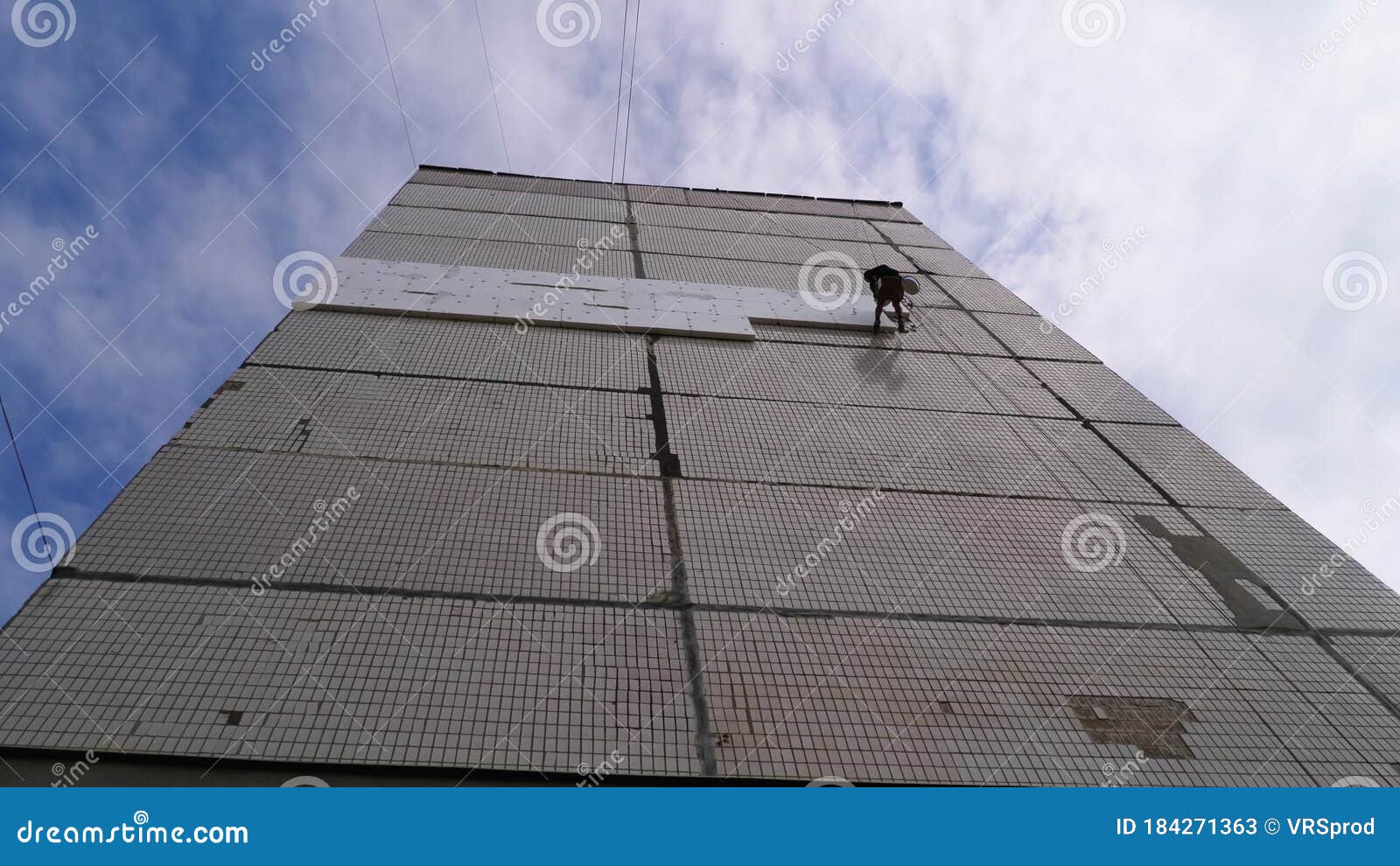 Industrial Climber Insulation of Facade Old High-Rise Building Using ...