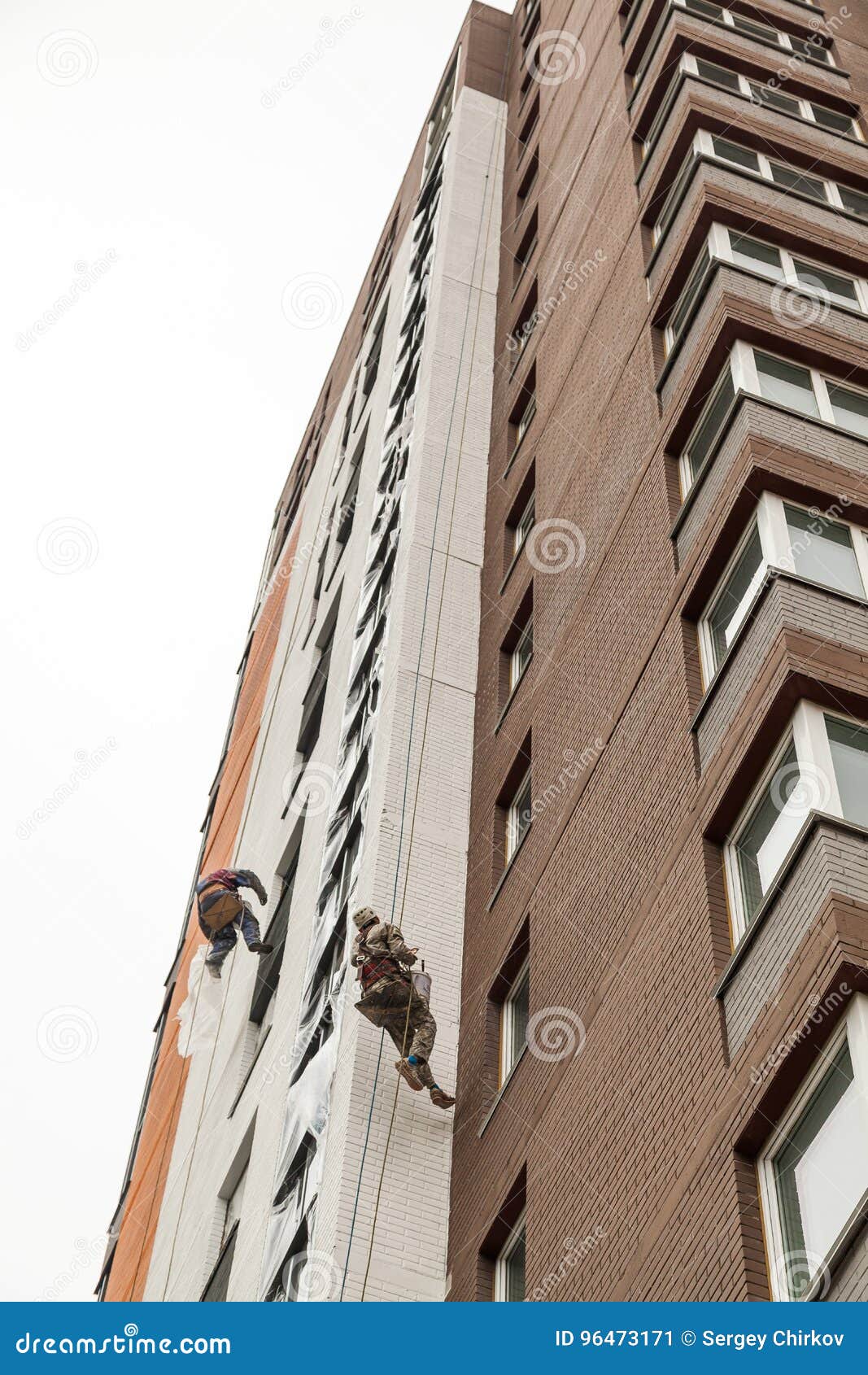 Industrial Climbers Climb on a Facade of the Building Stock Image ...