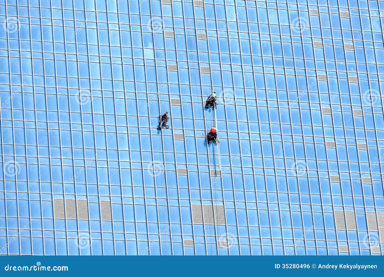 Industrial Climbers Working on Mirror Building Facade Stock Photo ...