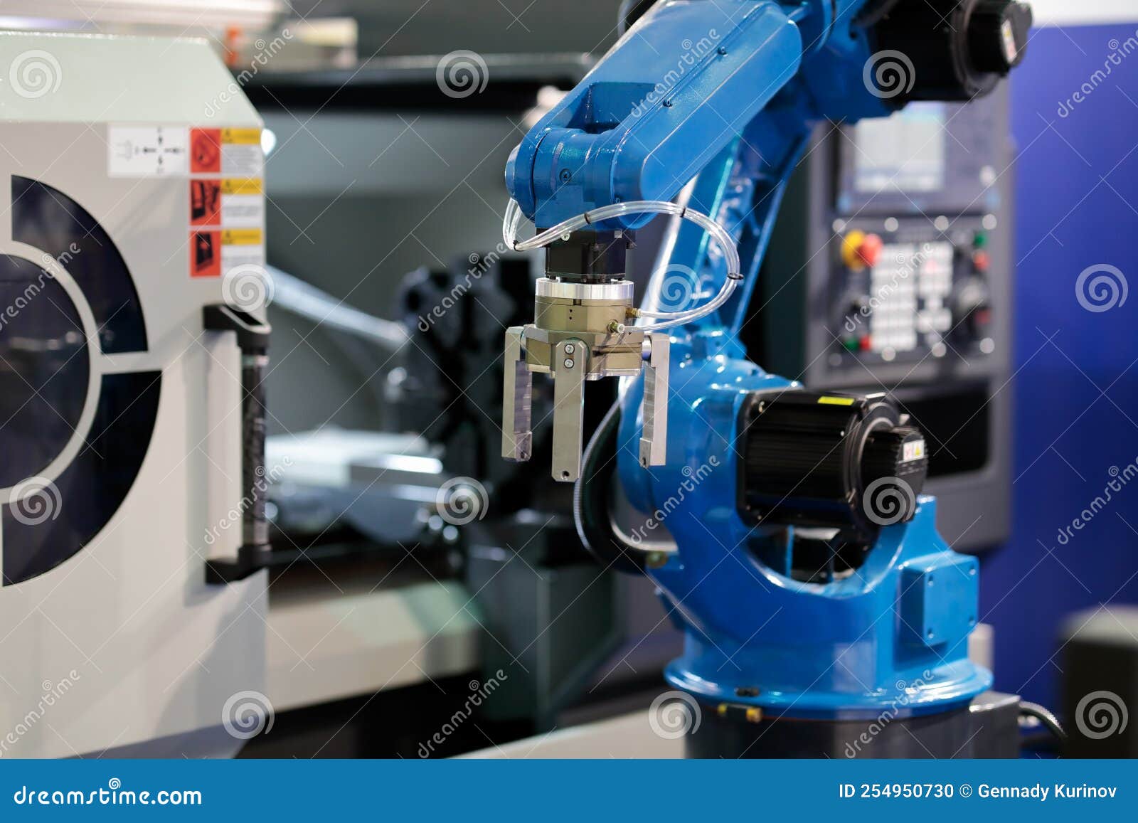 Industrial Collaborative Robot and CNC Machine Stock Photo - Image of ...