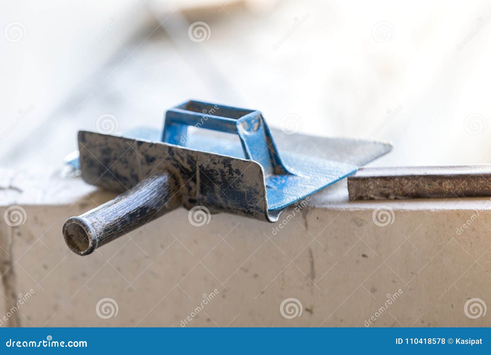 Construction trowel stock photo. Image of mortar, bucket - 110418578