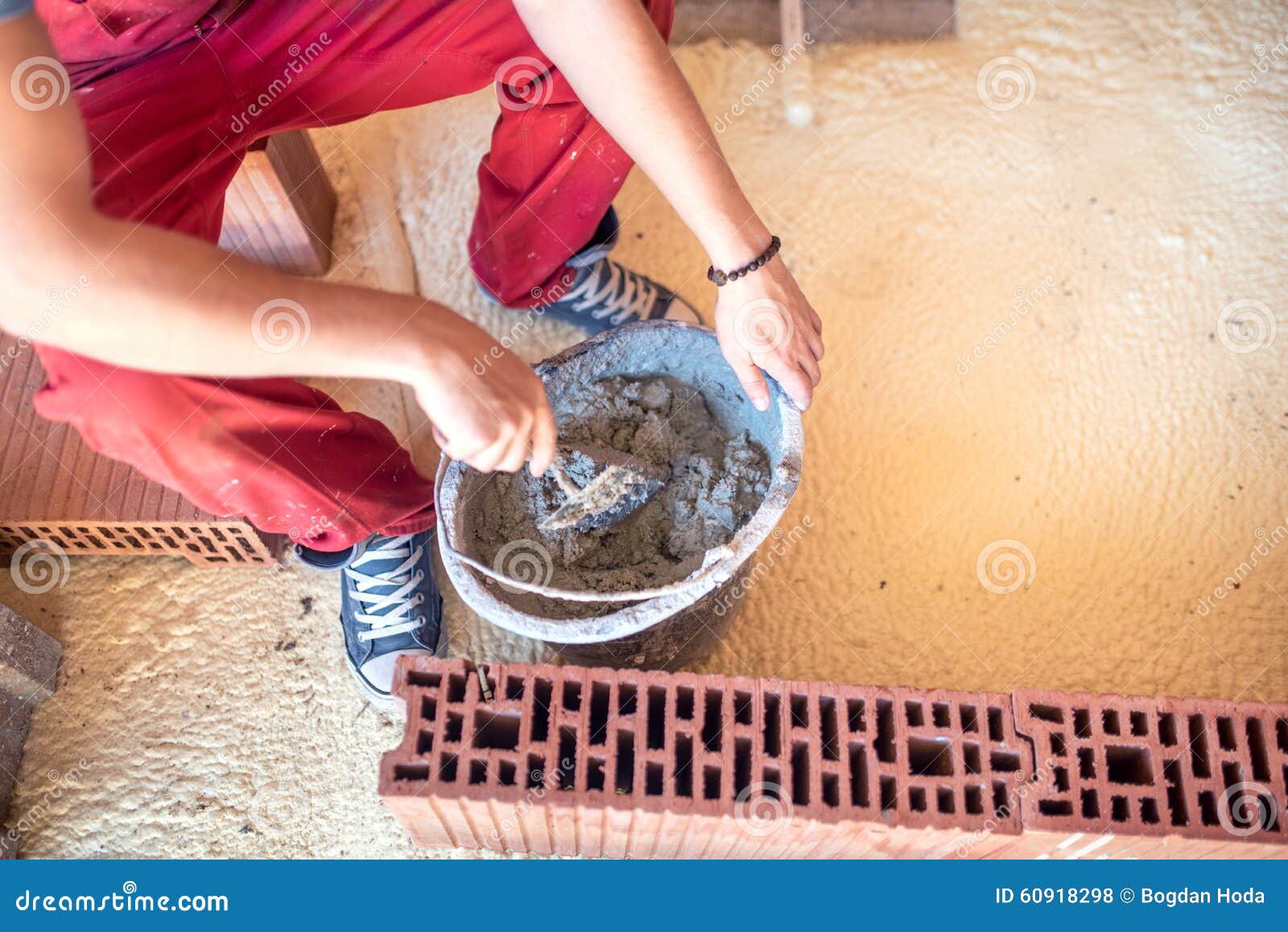Industrial Construction Worker, Preparing Mortar for Building Brick ...