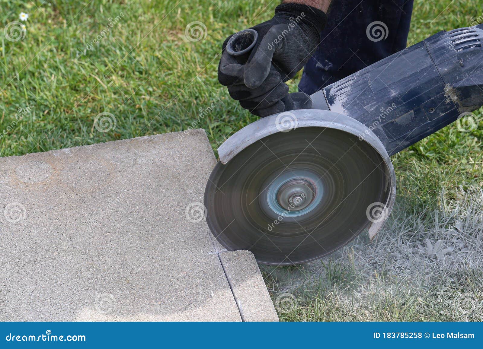 Industrial Construction Worker Using a Professional Angle Grinder Stock ...