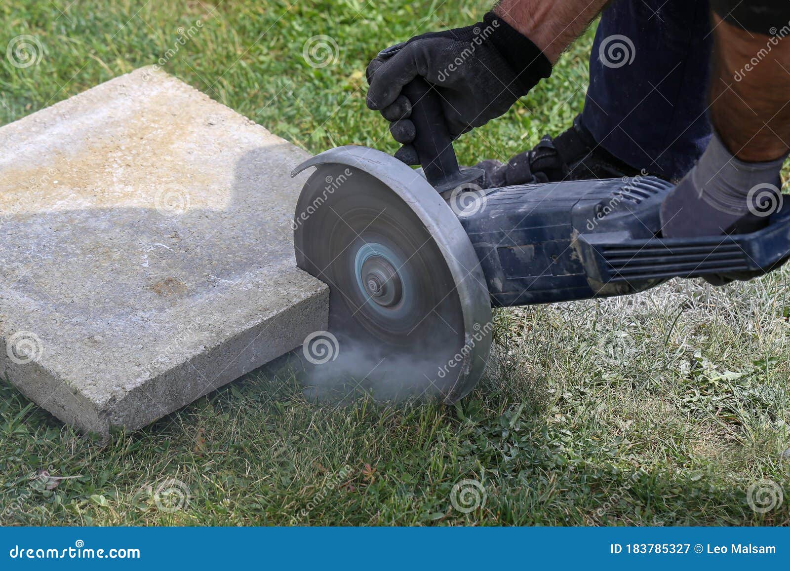 Industrial Construction Worker Using a Professional Angle Grinder Stock ...
