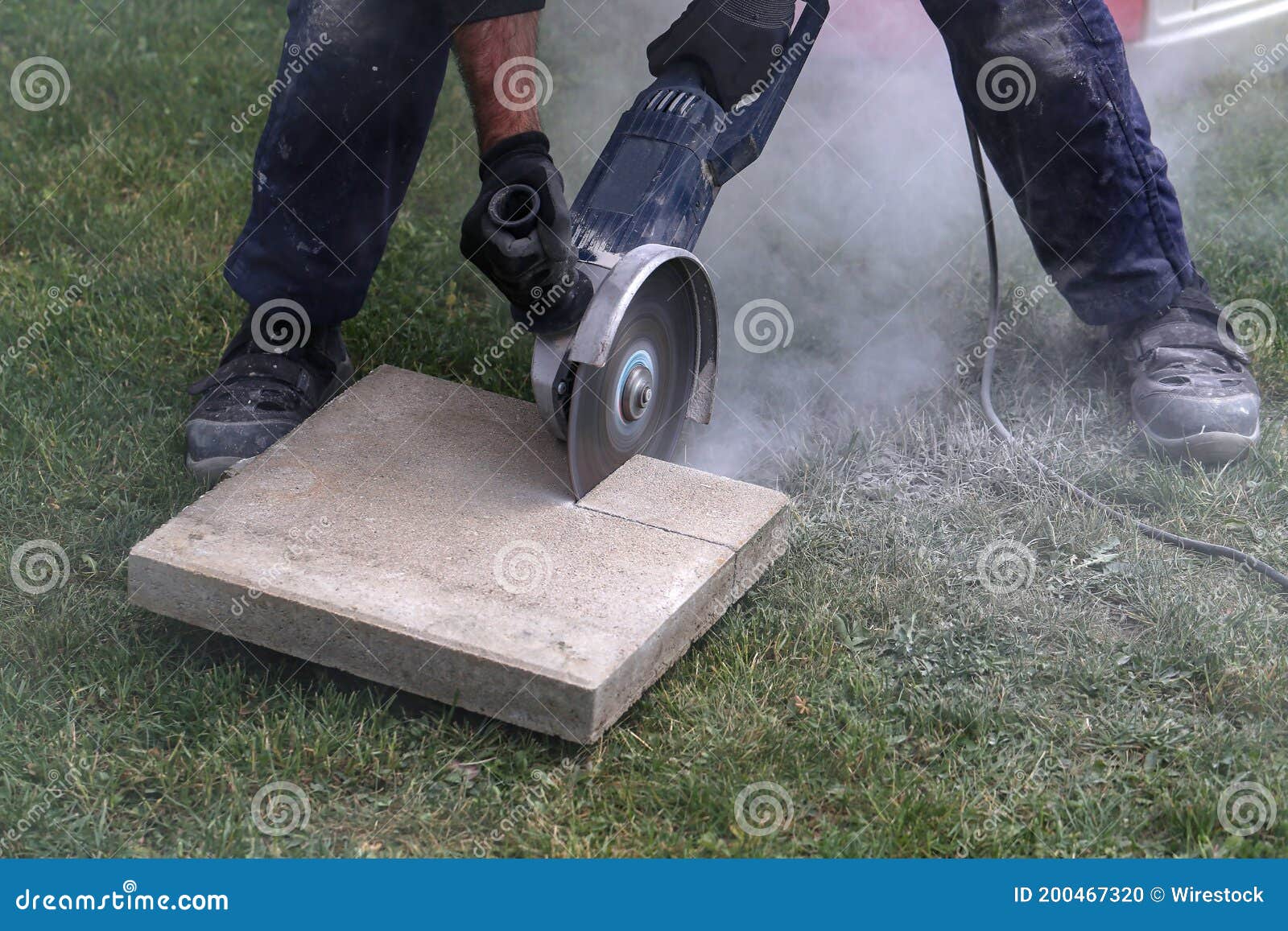 Industrial Construction Worker Using a Professional Angle Grinder Stock ...