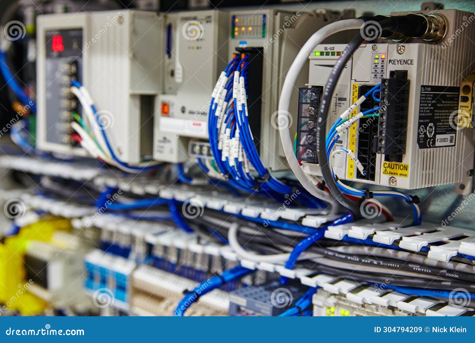 Industrial Control Panel with Network Cables and Safety Warning Stock ...