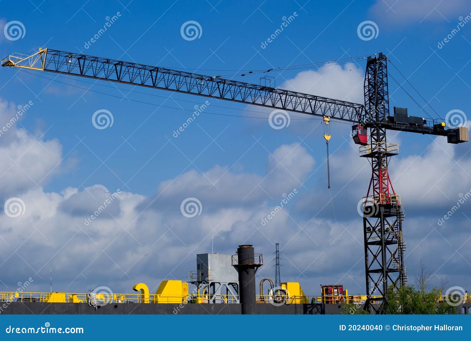Industrial Crane Operating And Lifting An Electric Generator Stock ...