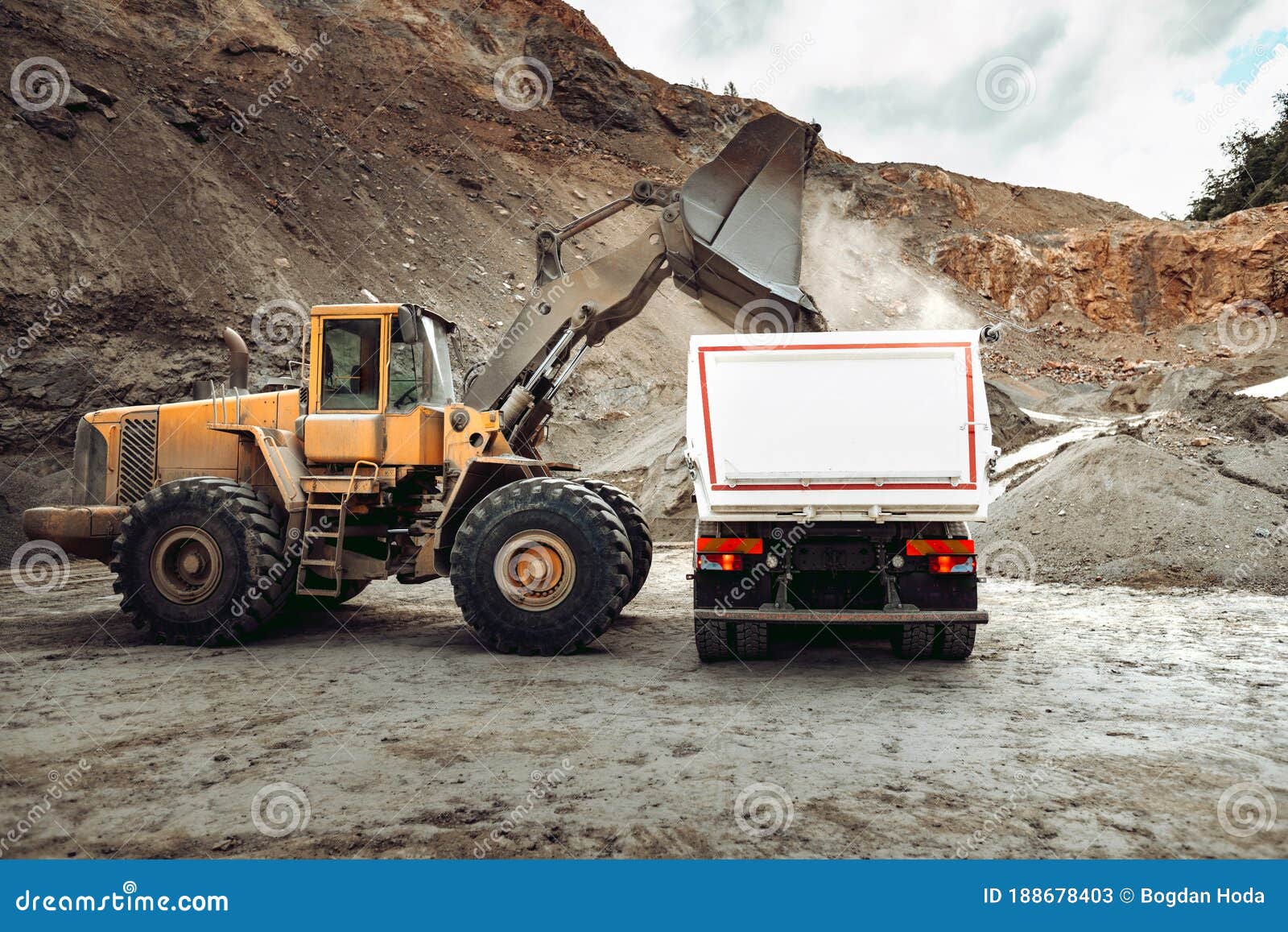 Industrial Dumper Trucks and Wheel Loader Bulldozer Working on Highway ... Industrial Dumper Trucks and Wheel Loader Bulldozer Working on Highway ...