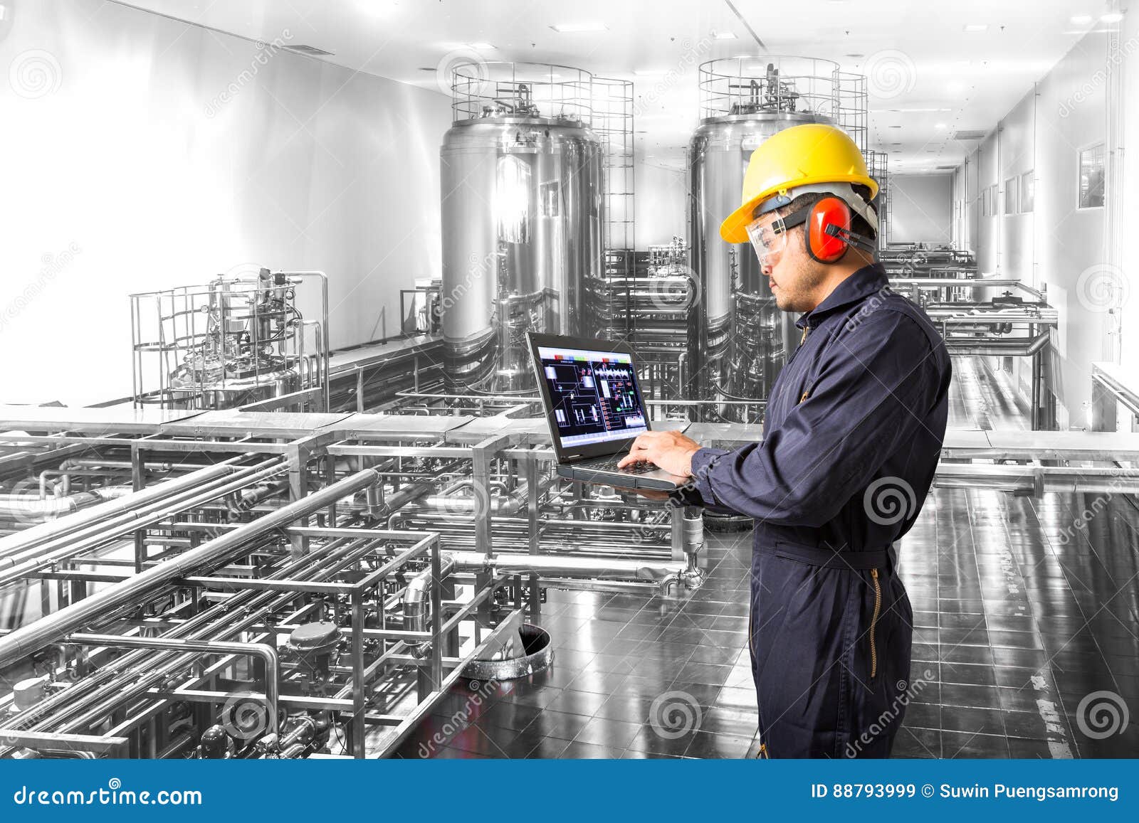 Industrial Engineer Checking Machine Status with Laptop Computer Stock ...