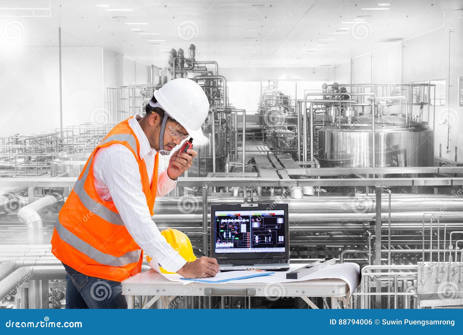 Industrial Engineer Checking Machine Status with Laptop Computer Stock ...