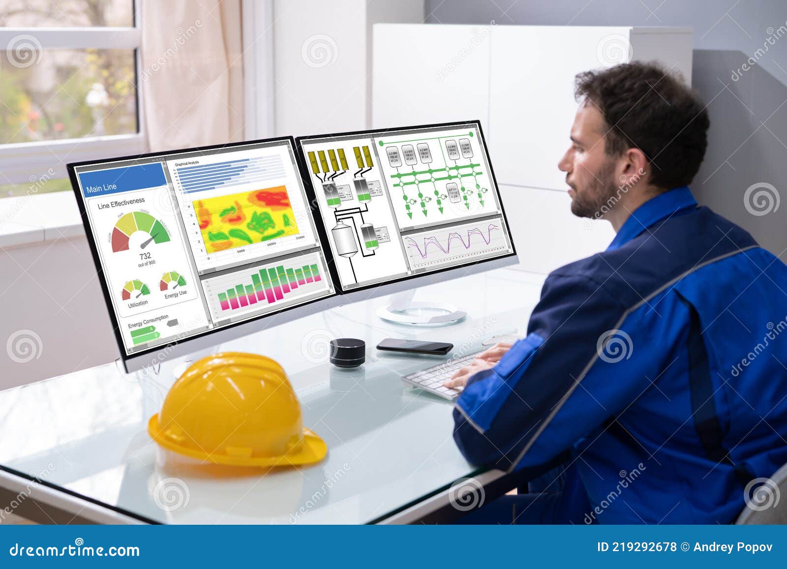 Engineer Sitting Placing Safety Hard Hat On The Table Coffee Cup Pen ...