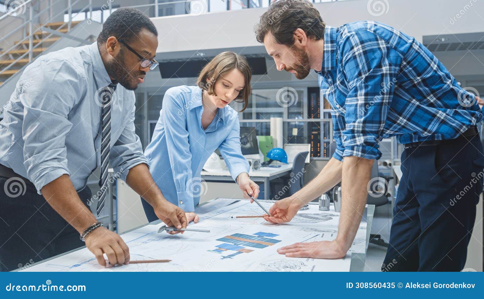 In the Industrial Engineering Facility: Female Designer Works with ...