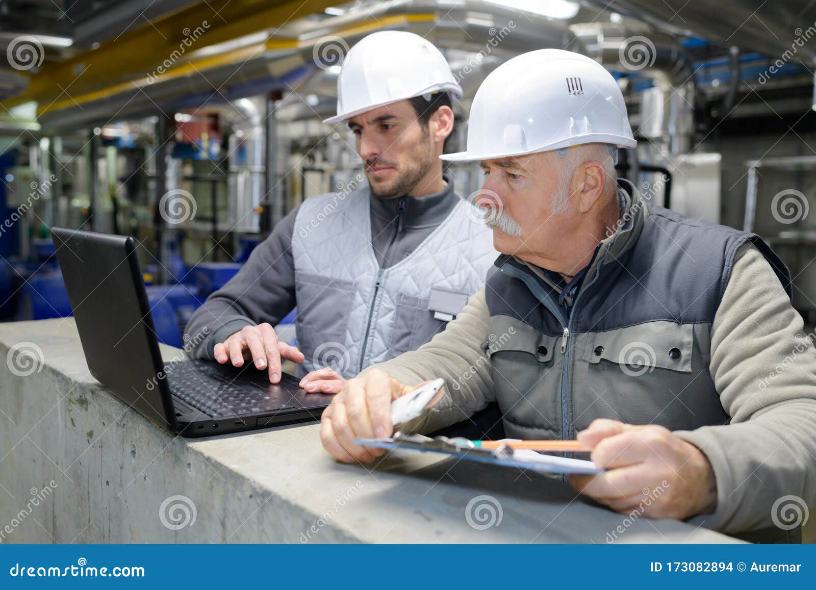 Industrial Engineers Looking at Laptop Information Stock Photo - Image ...