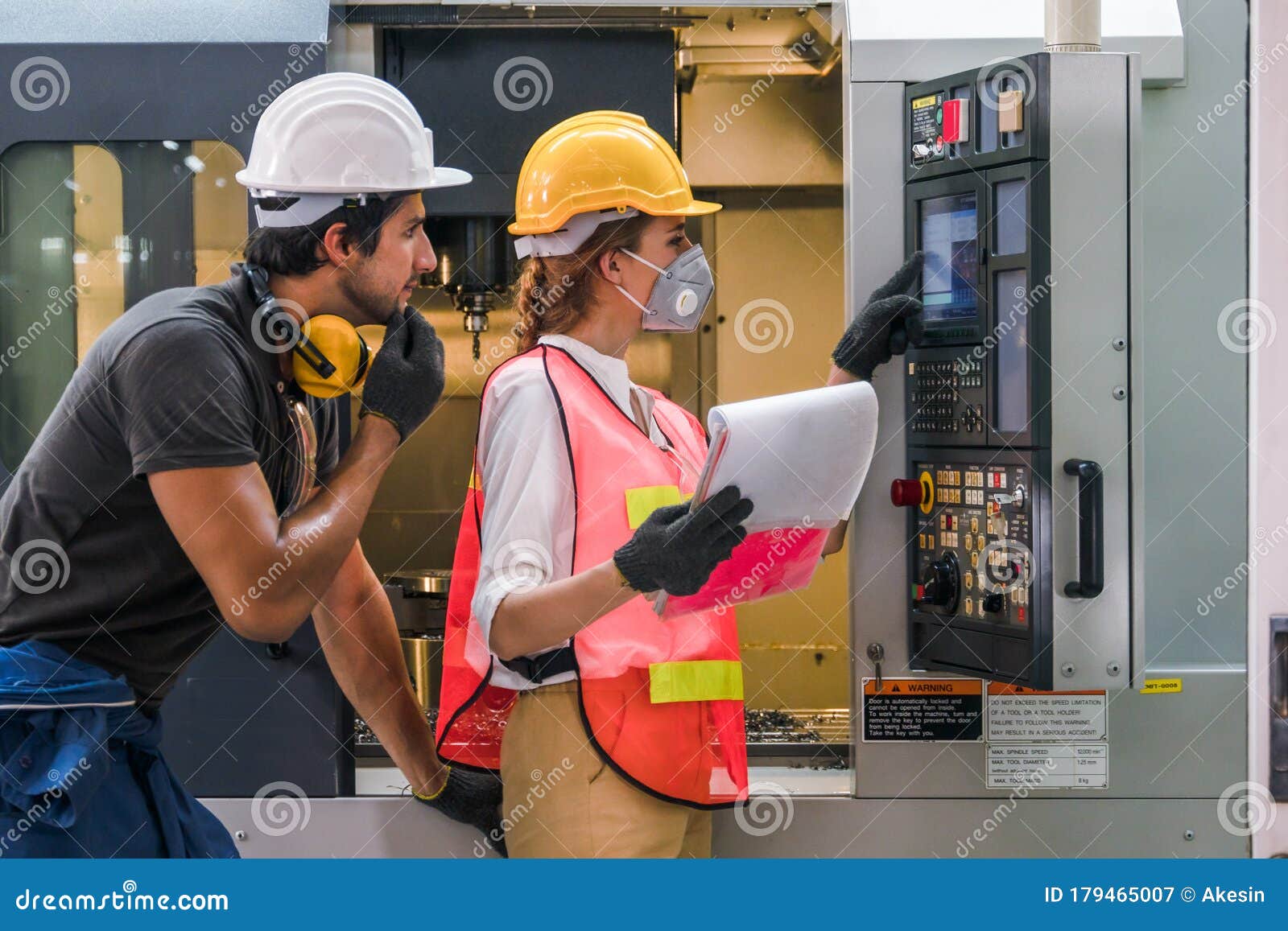 Industrial or Factory Engineering Worker and Supervisor Setting Up ...